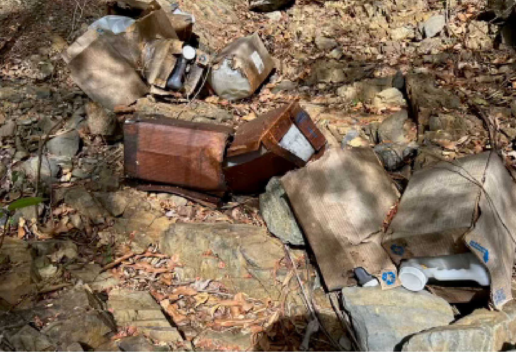 Potential Environmental Hazards as Oil Containers Dumped Near Creque Dam